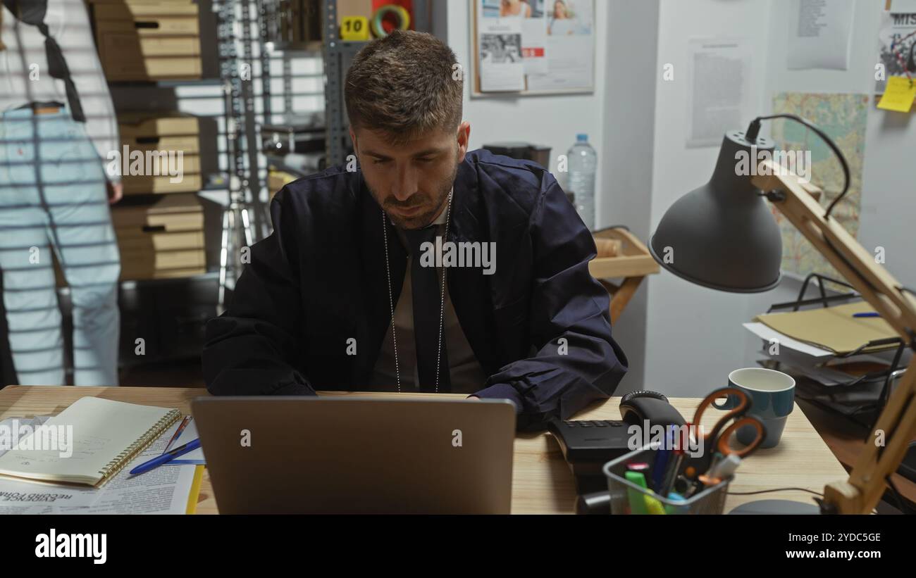 Focused man working at computer in cluttered detective office, woman ...