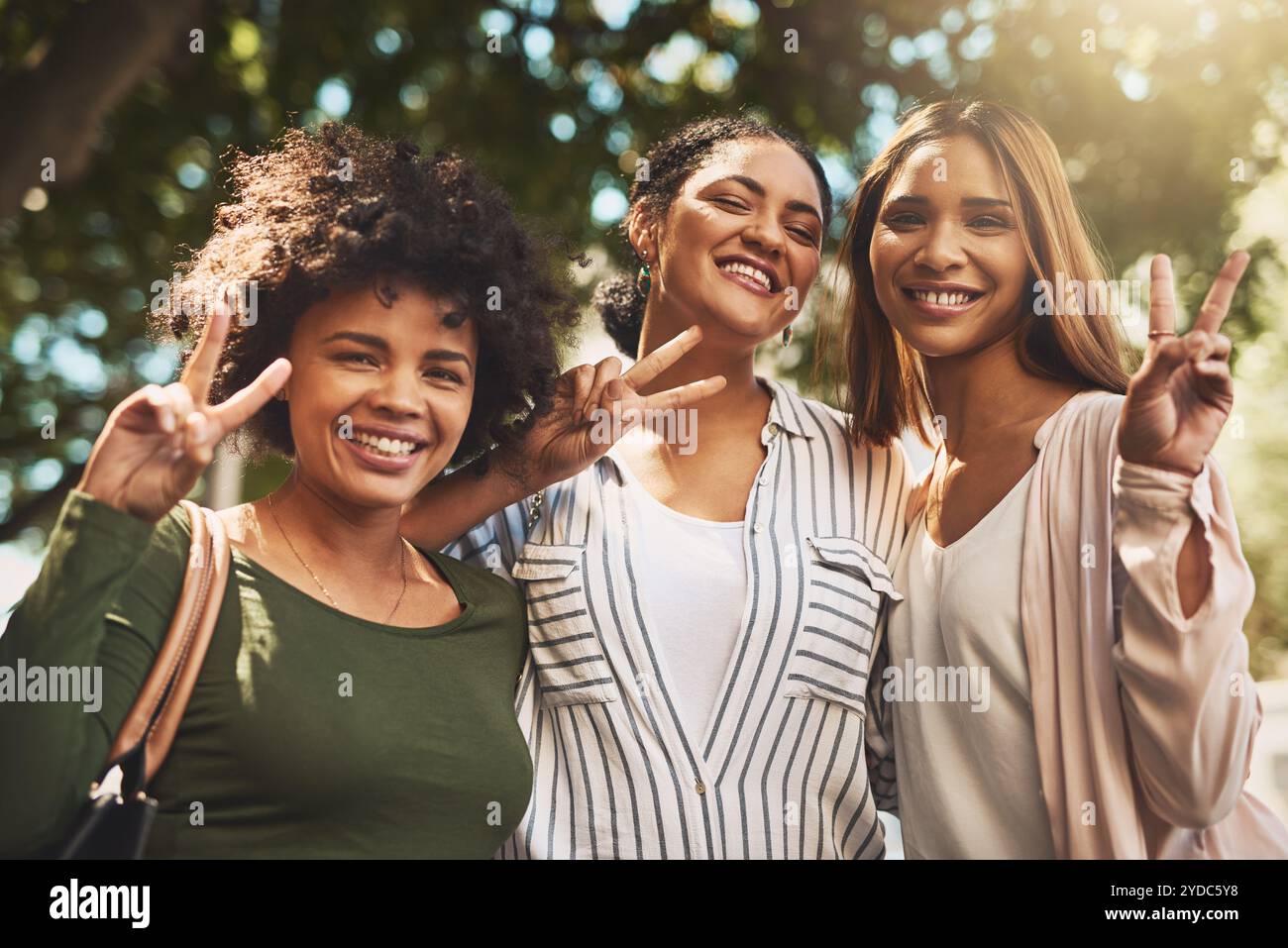 Business, peace sign and portrait with woman friends outdoor together ...