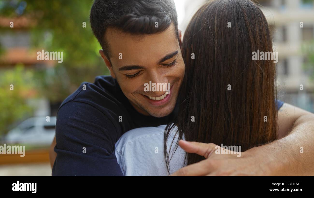Man hugging woman with a smile, showing love and connection in an ...