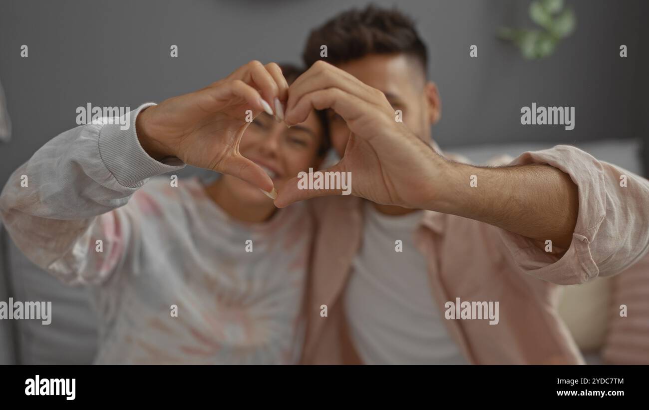 Love romantic young couple forming hi-res stock photography and images ...