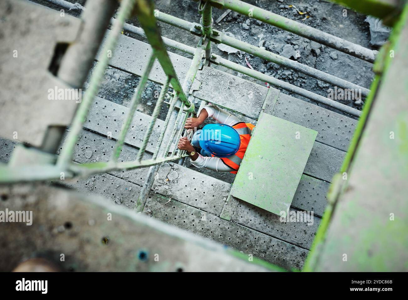 Ladder, construction site and worker in building with engineering ...
