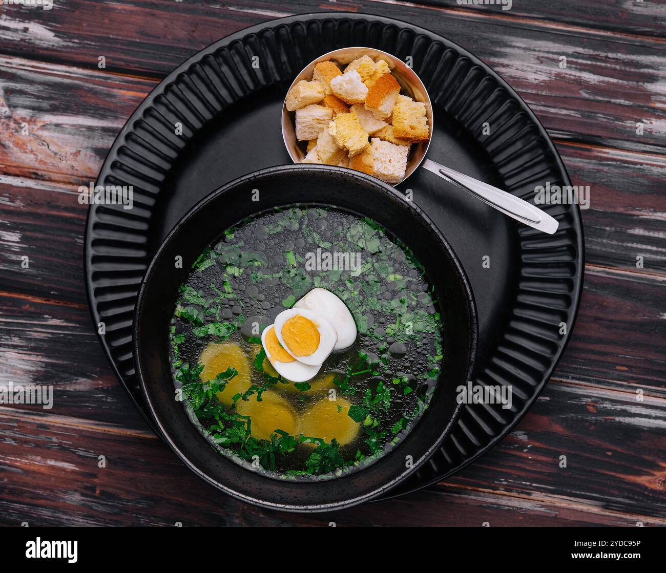 Homemade bouillon or broth with egg Stock Photo - Alamy