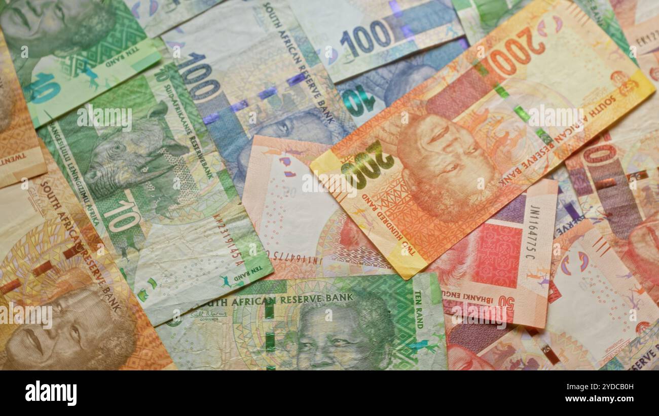 South african banknotes featuring nelson mandela spread out, showcasing ...