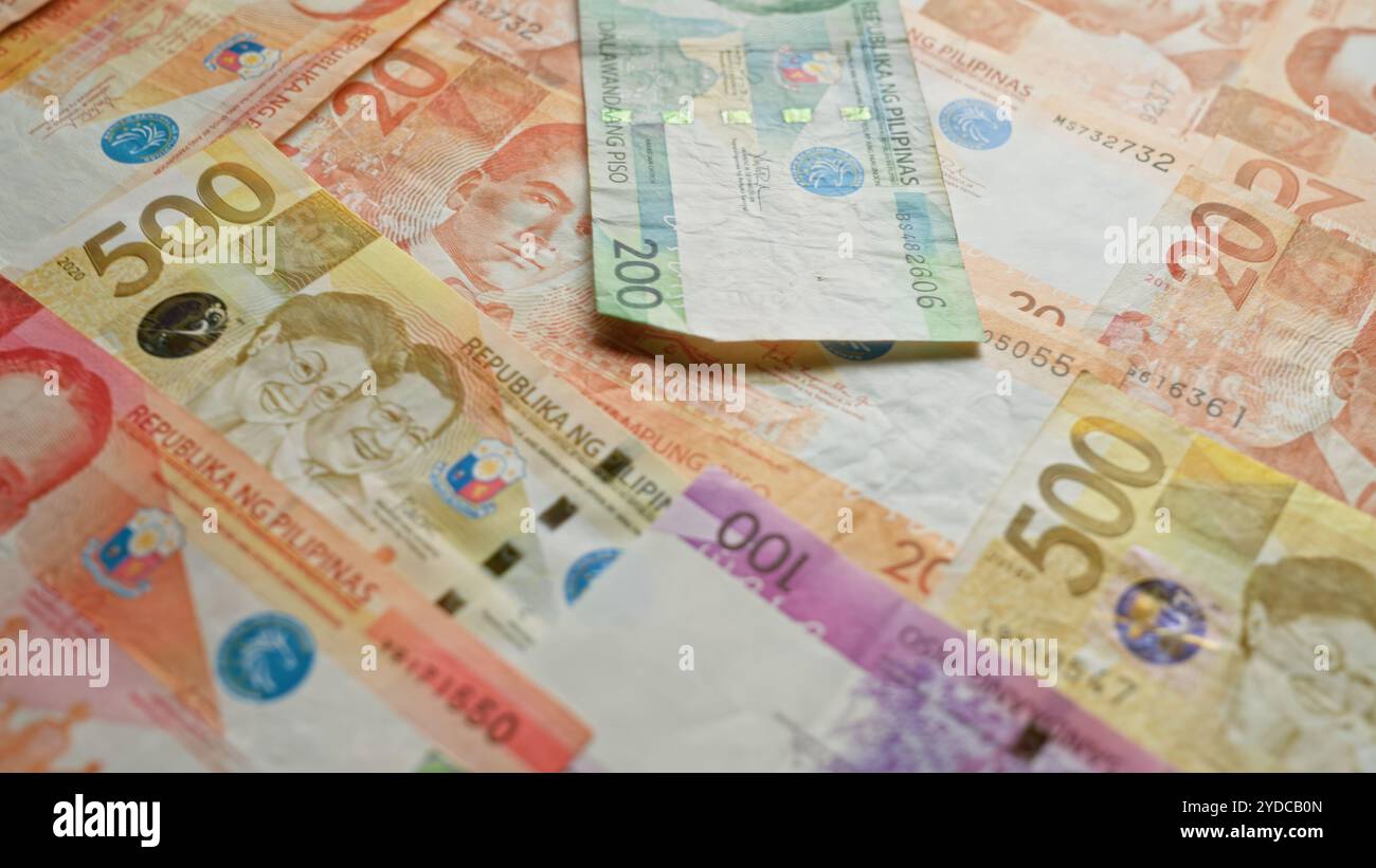 Philippine banknotes in various denominations such as 500, 200, 100 ...