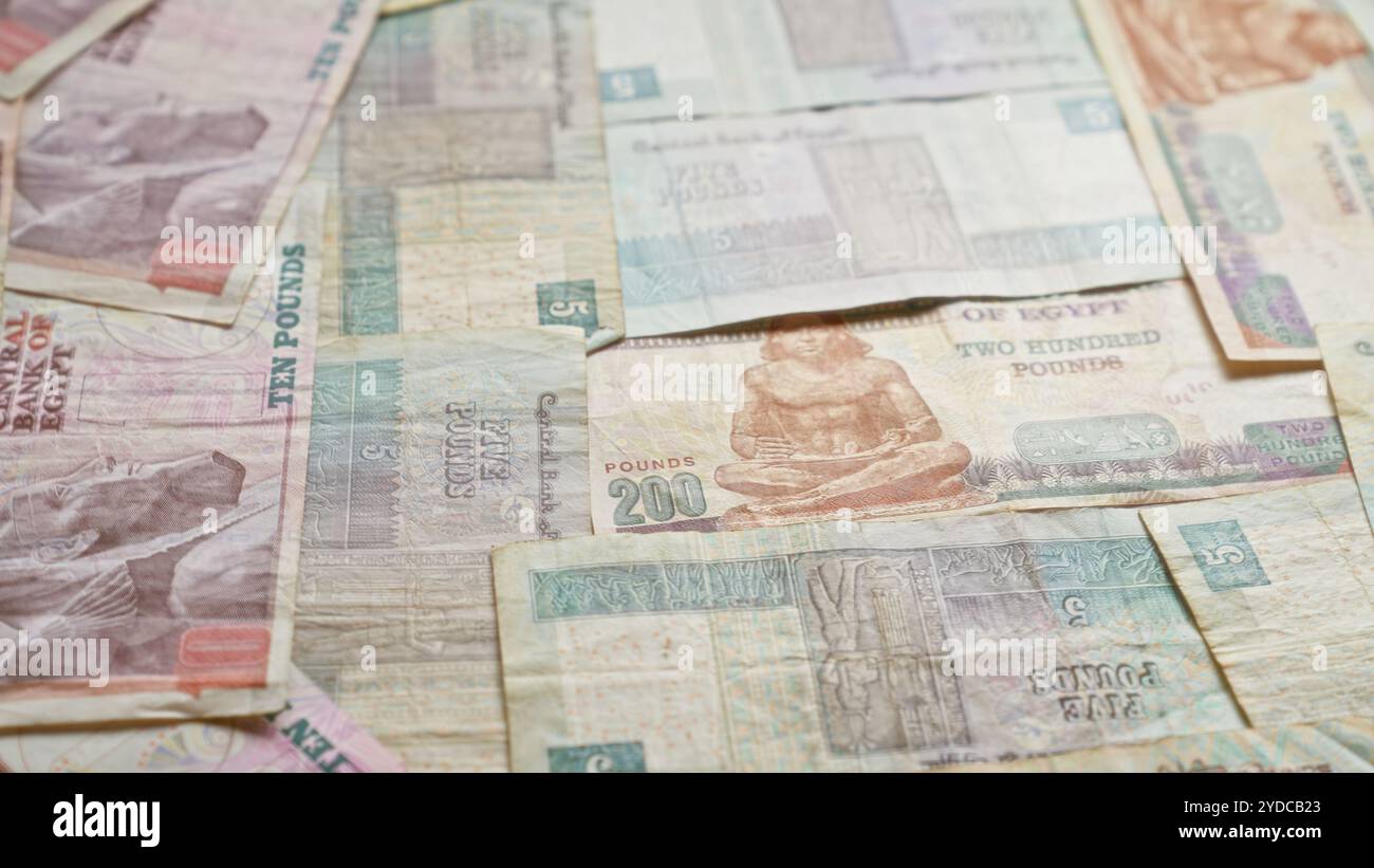 Egyptian banknotes including five, ten, and two hundred pounds spread ...