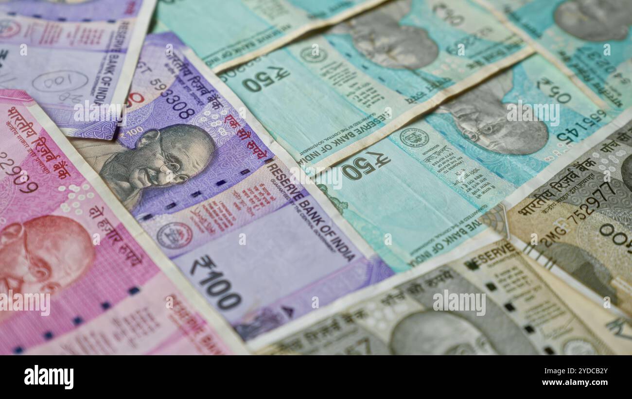 Indian rupee banknotes spread out showcasing various denominations ...