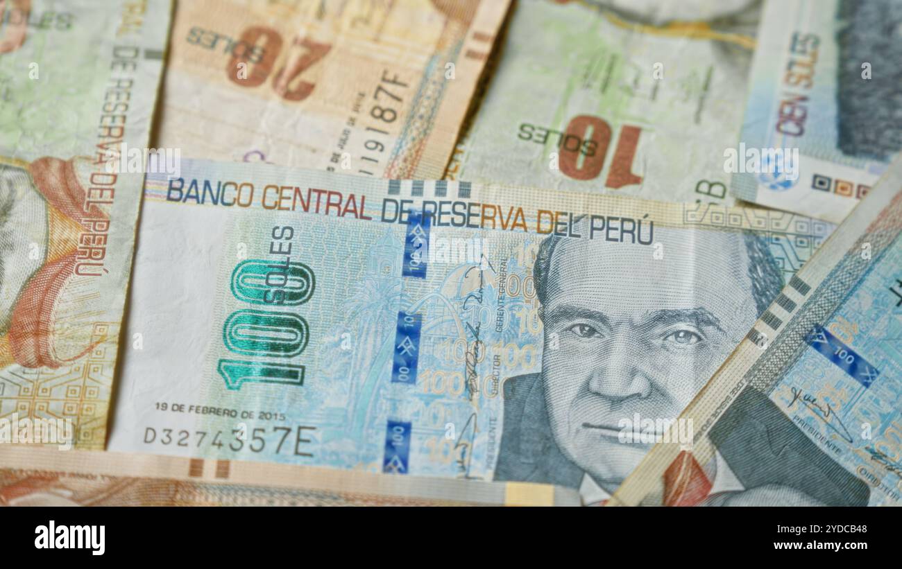 Peruvian banknotes featuring various denominations and designs are ...