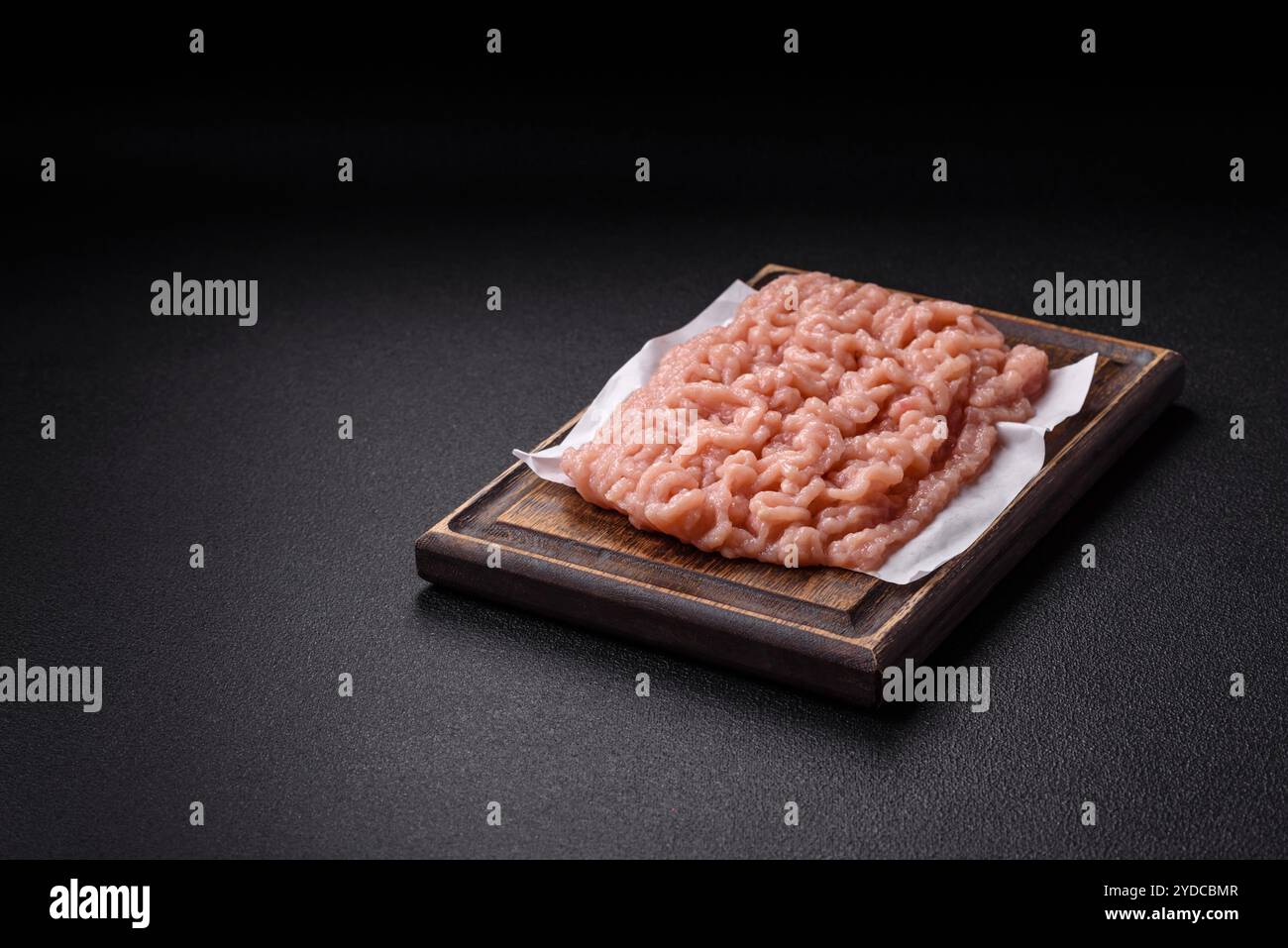 Fresh raw chicken mince with salt and spices Stock Photo - Alamy