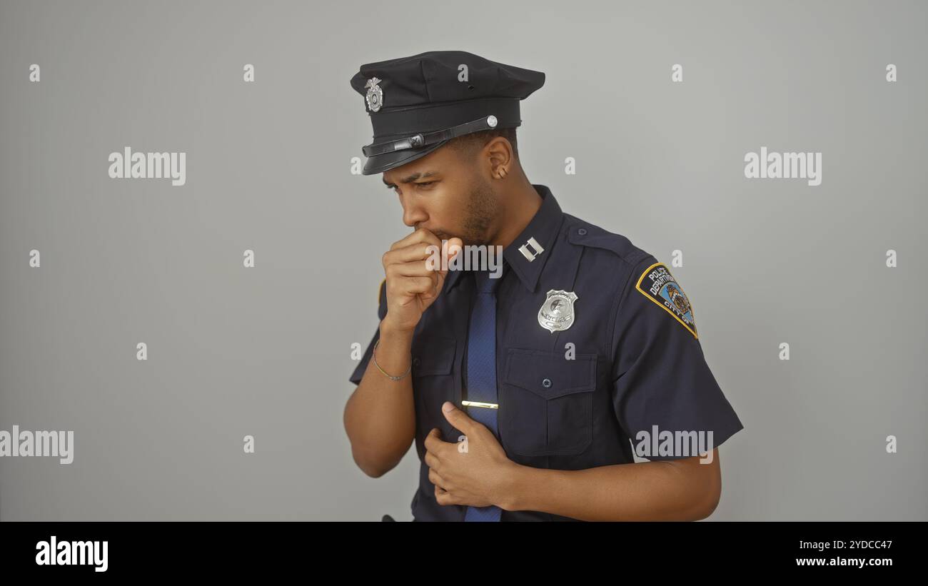 African american police officer in uniform coughing against a white ...