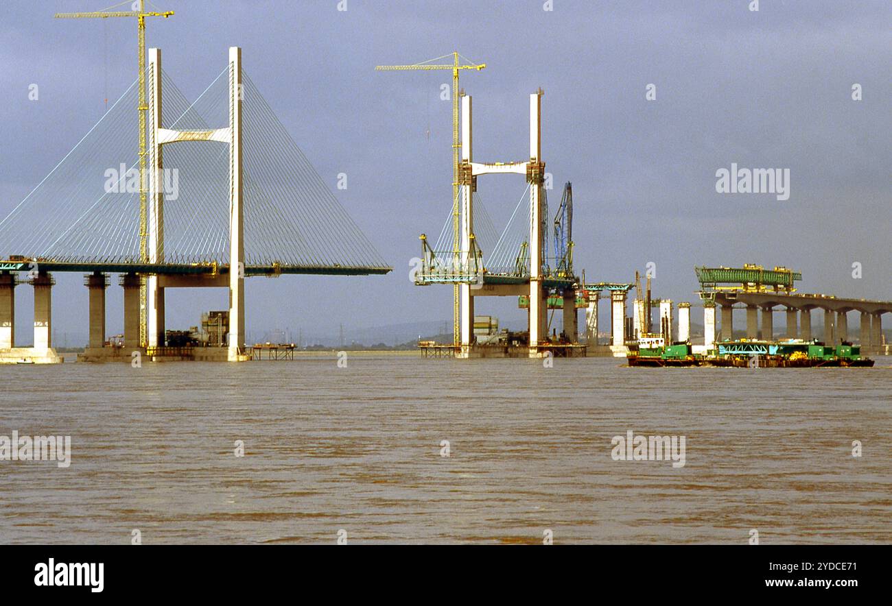 The Sar-3 barge approaching the cable stay concrete towers with a road ...