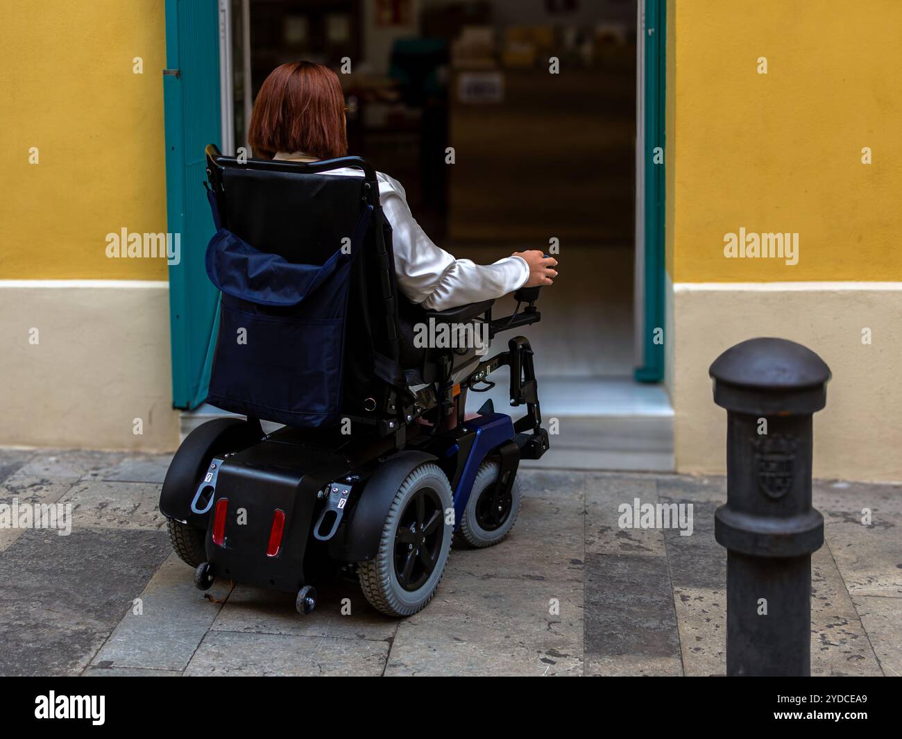 Wheelchair User Facing Accessibility Barrier at Store Entrance Stock ...