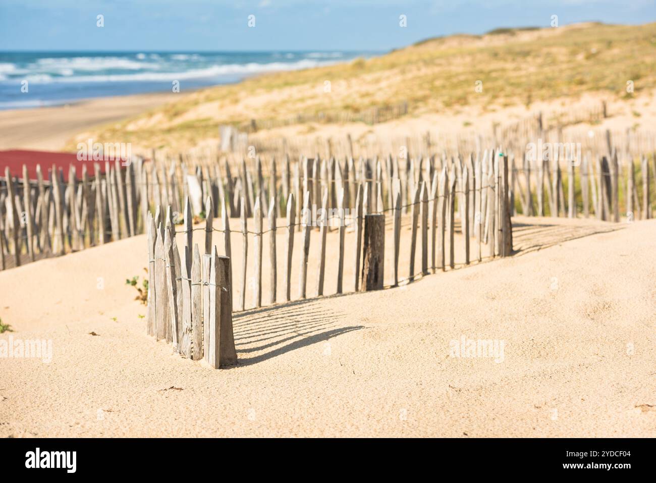 Wooden fence on Atlantic beach in France Stock Photo - Alamy