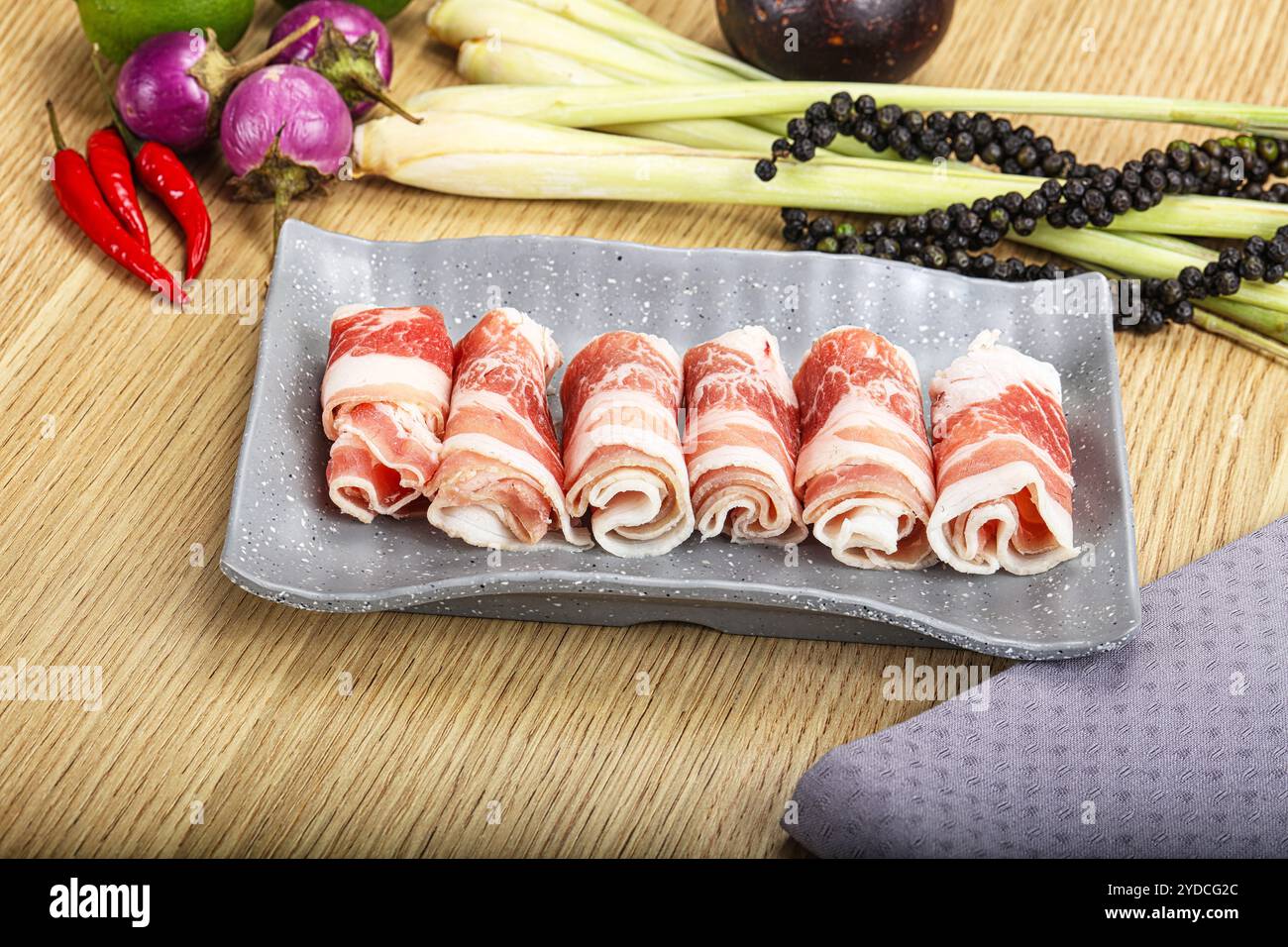 Raw beef bacon roll for grill Stock Photo - Alamy