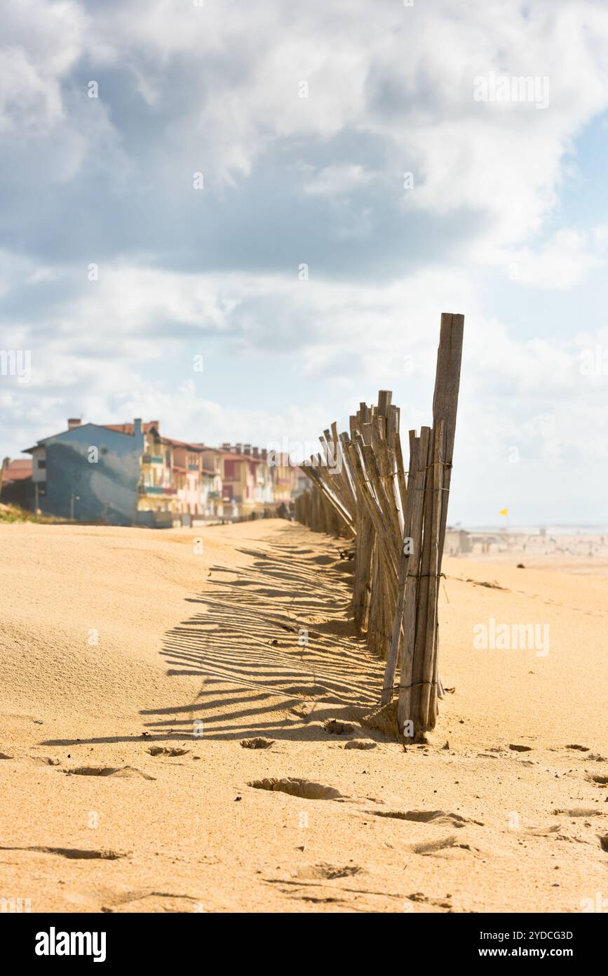 Wooden fence on Atlantic beach in France Stock Photo - Alamy