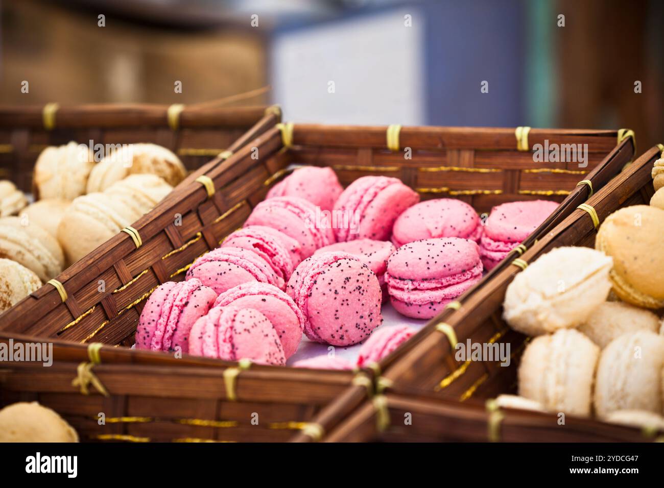 Macarons assortment in a wickered boxes Stock Photo - Alamy