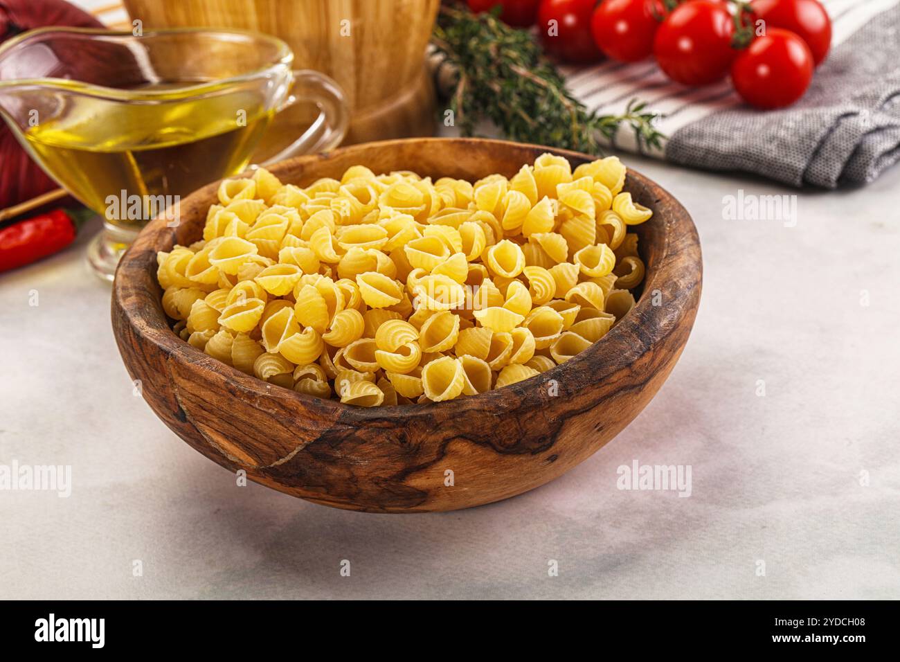 Italian cuisine - dry conchiglie shell pasta Stock Photo - Alamy