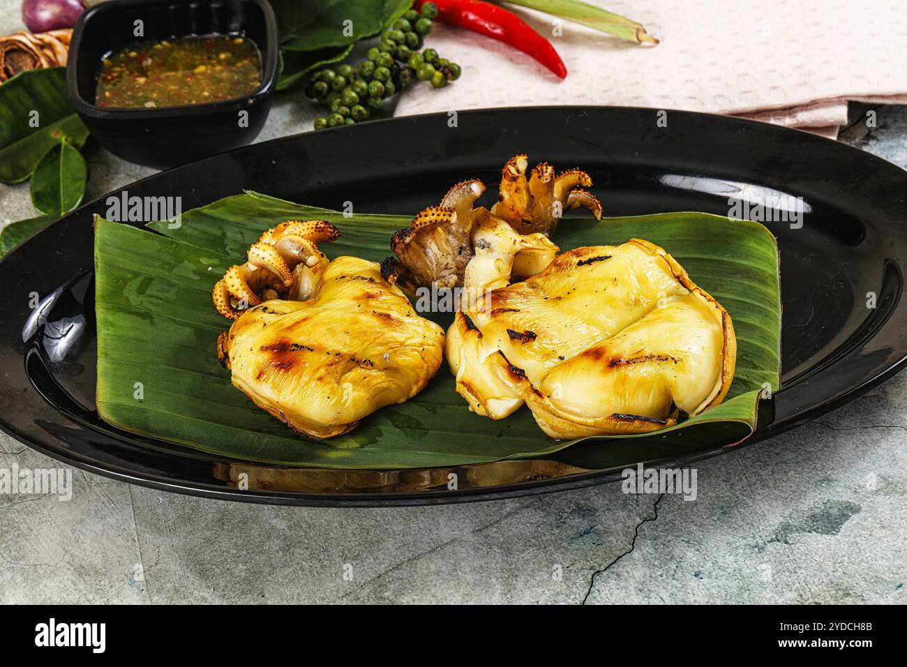 Delicous Grilled cuttlefish with sauce asian style Stock Photo - Alamy