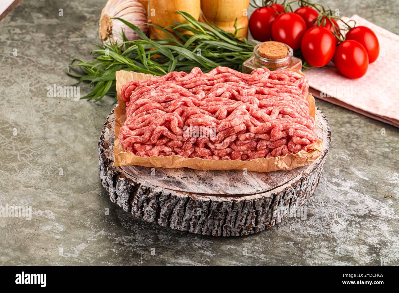 Raw uncooked red minced meat over board Stock Photo - Alamy