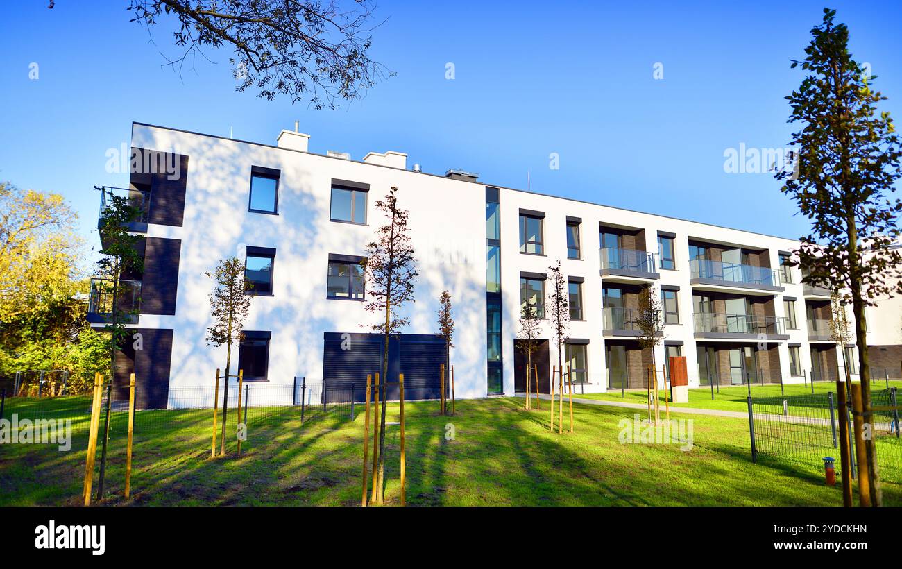 Modern eco friendly apartment buildings with green trees. Modern ...
