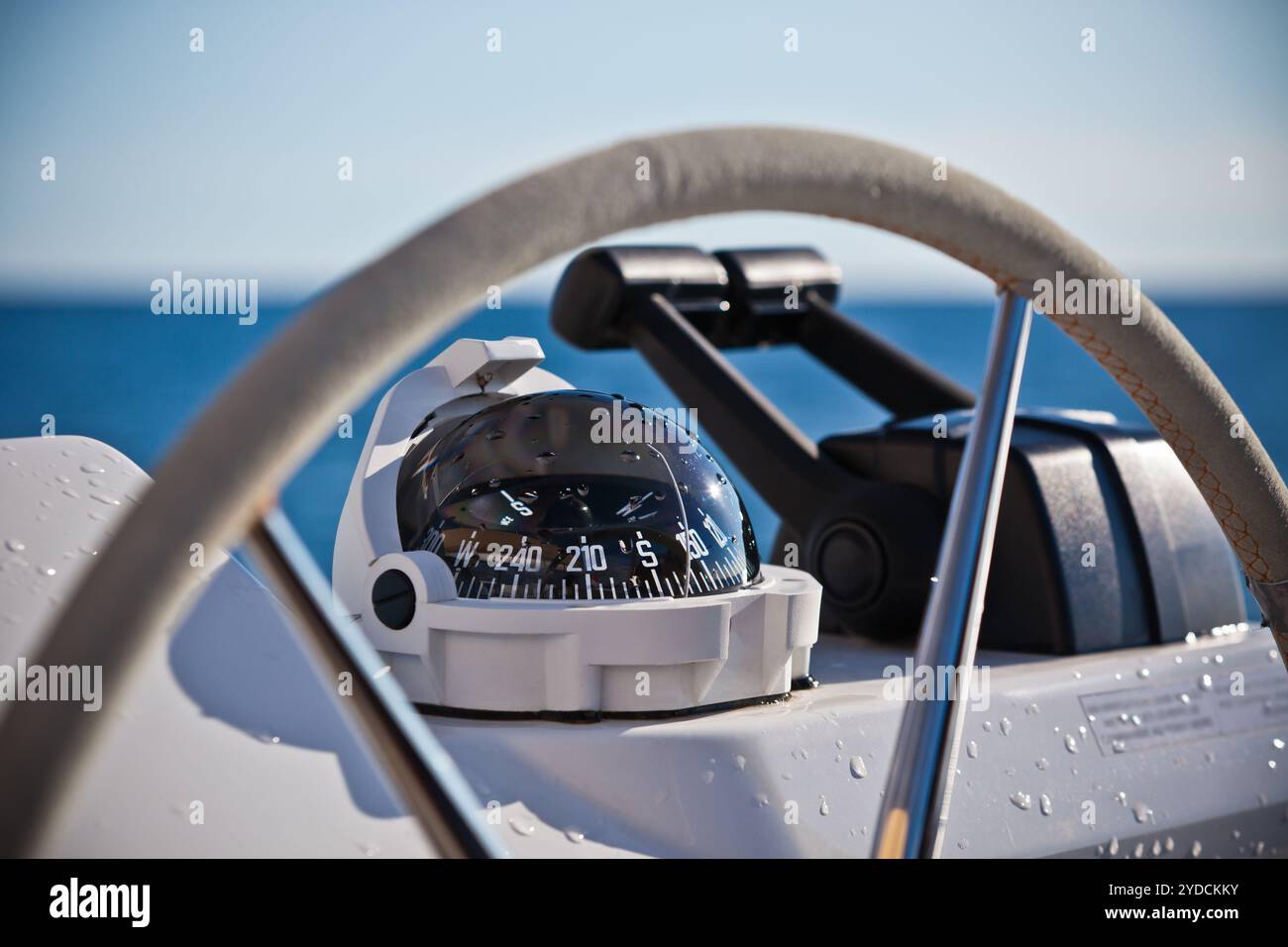Sailing yacht control wheel and implement. Horizontal shot without ... Sailing yacht control wheel and implement. Horizontal shot without ...