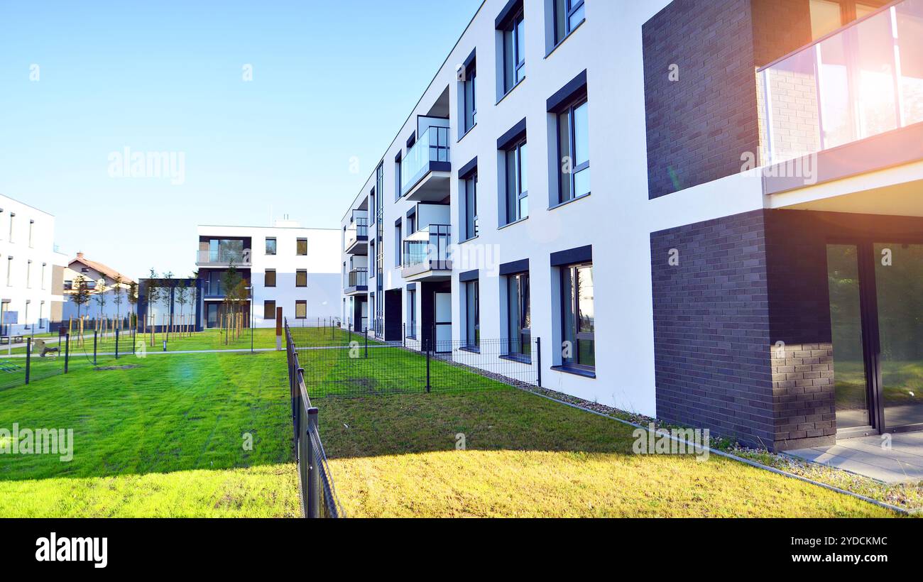Modern eco friendly apartment buildings with green trees. Modern ...