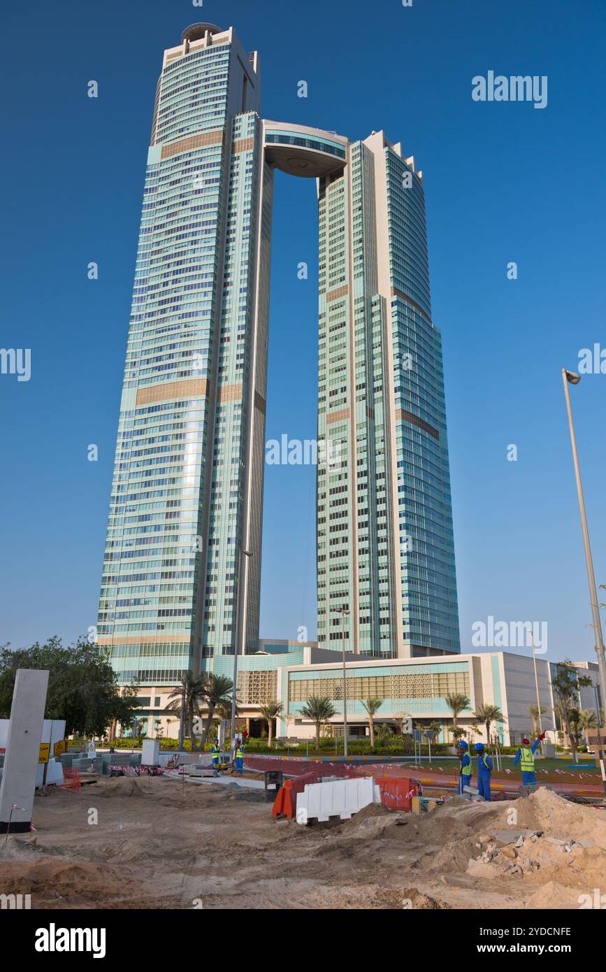 Tall buildings under construction in Abu Dhabi, UAE Stock Photo - Alamy