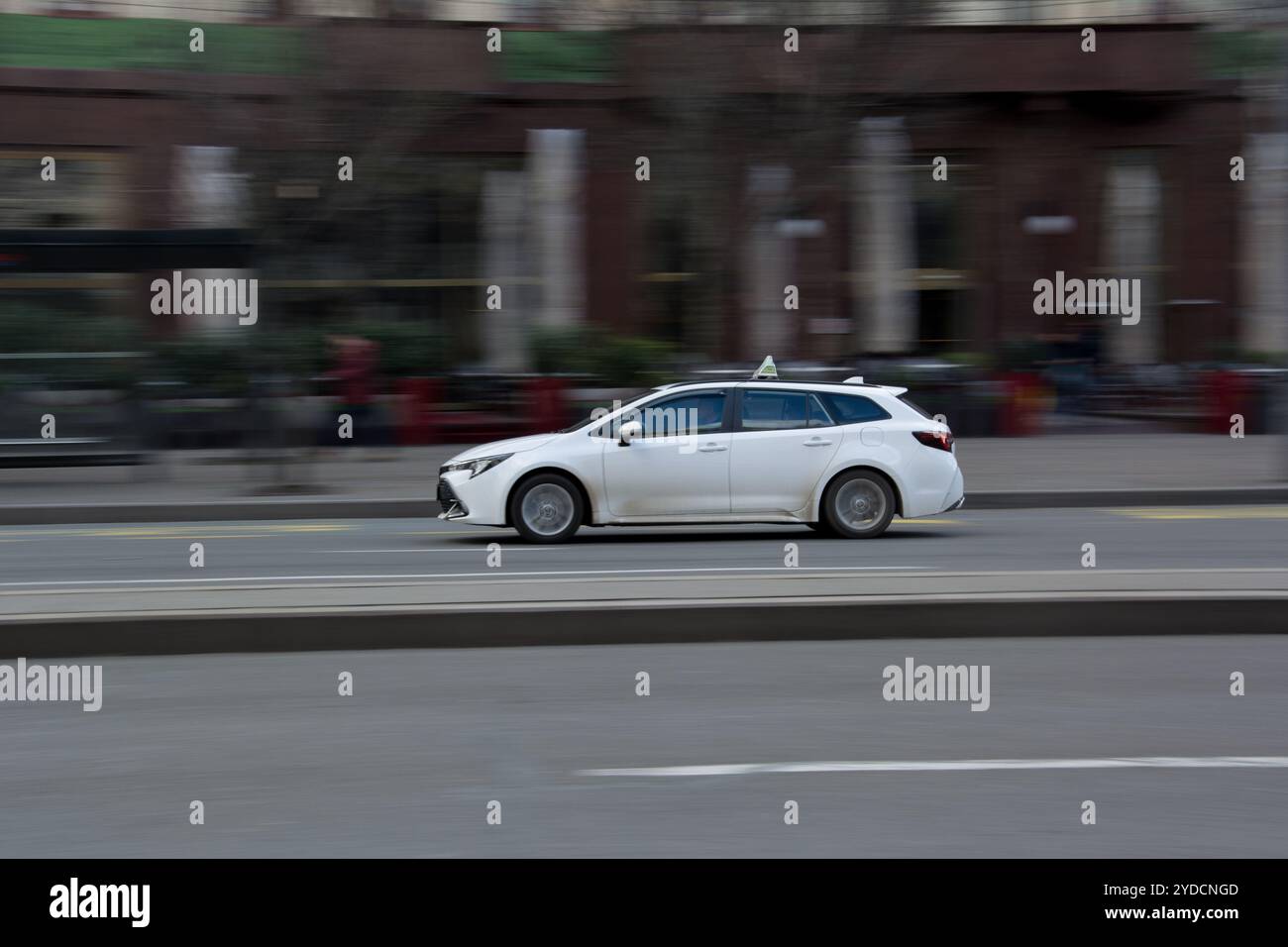 Car in a motion through the city Stock Photo - Alamy