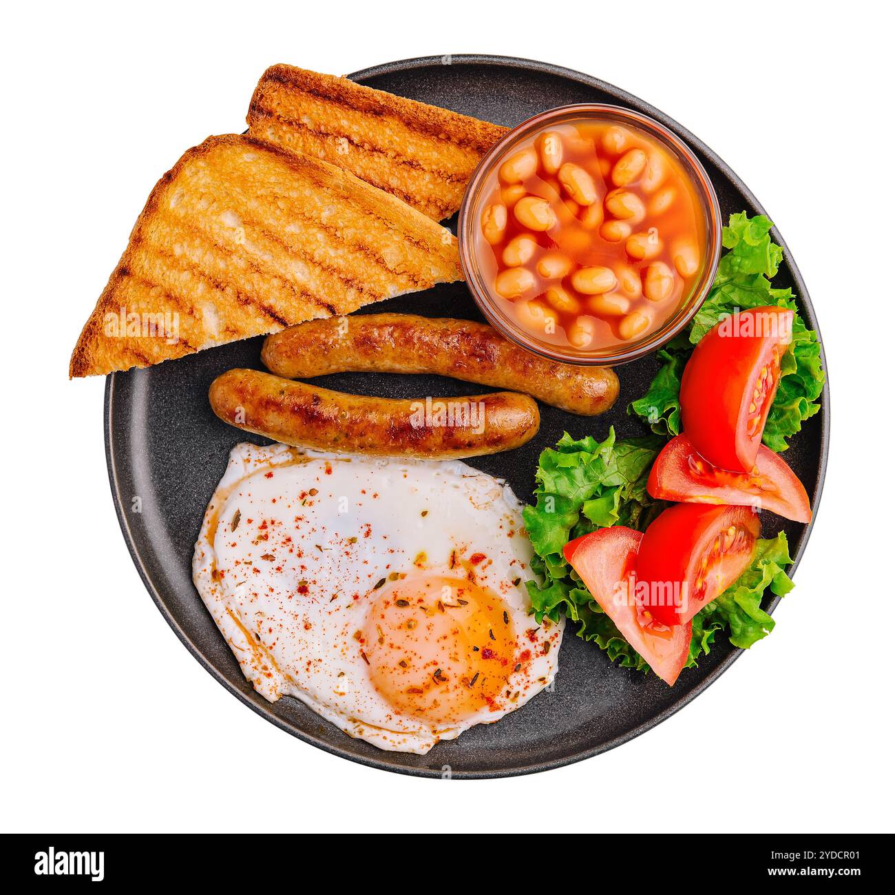 English breakfast on black pan top view Stock Photo - Alamy