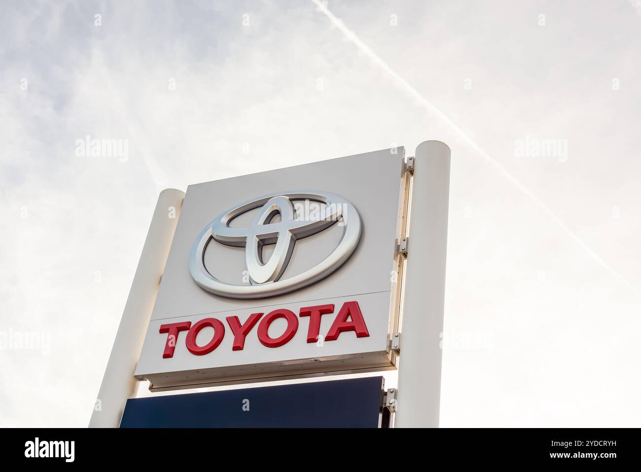 Toyota Motor Corporation brand logo on sky background located on its ...
