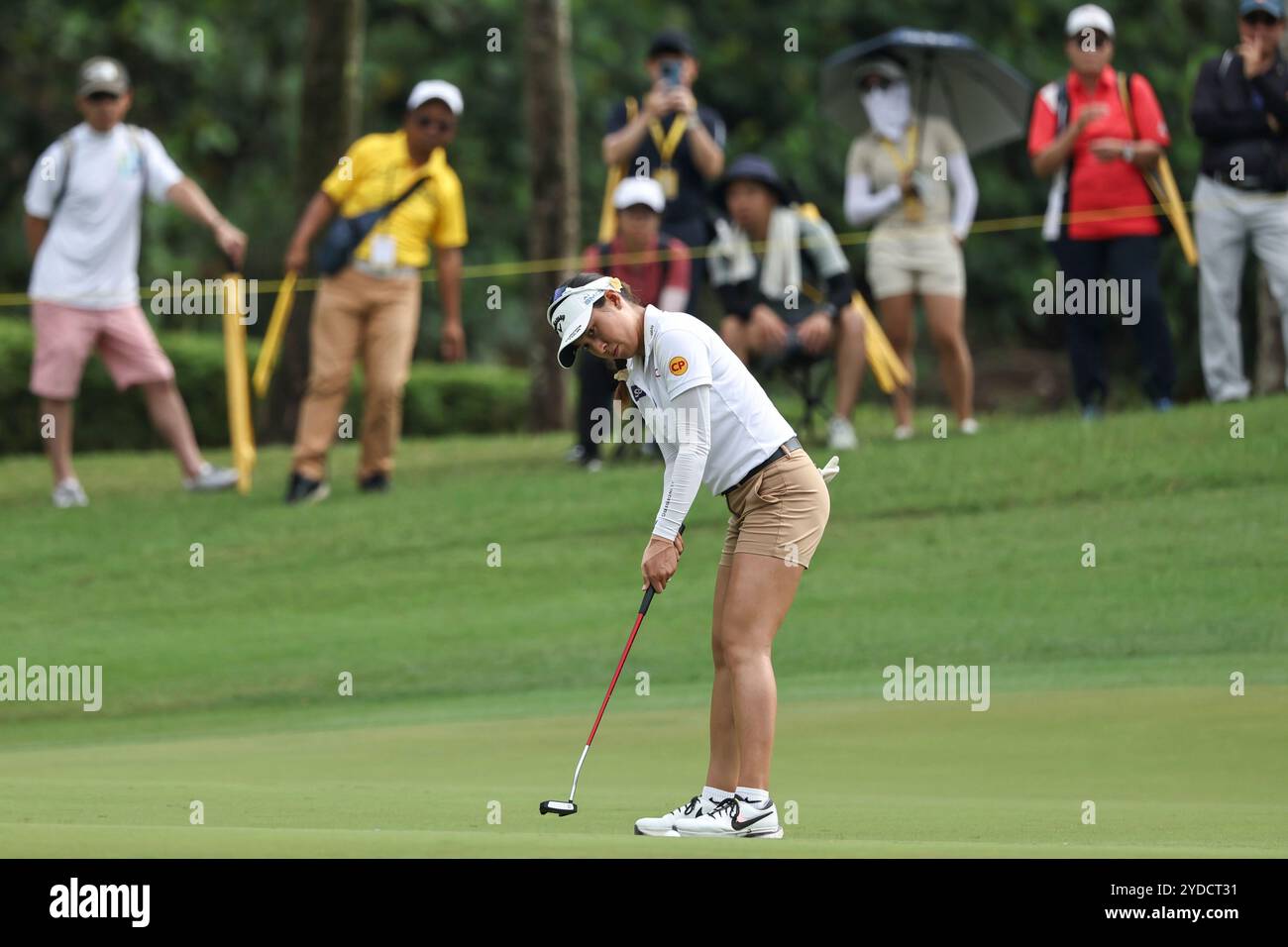 KUALA LUMPUR, - OCTOBER 26: Atthaya 'Jeeno' Thitikul of Thailand play a shot during the third ...