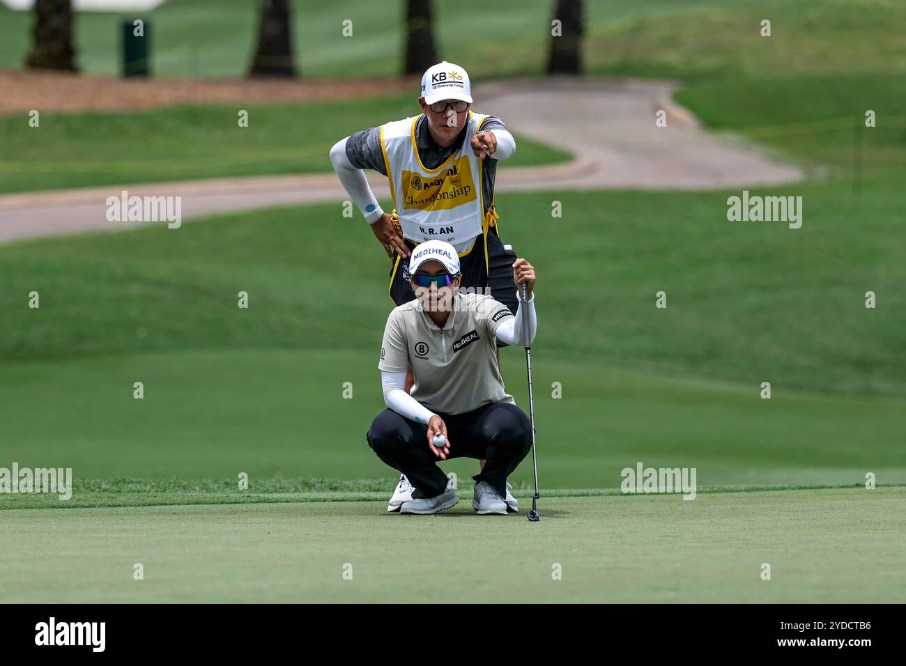 KUALA LUMPUR, - OCTOBER 26: Narin An of Republic of Korea listen to her ...