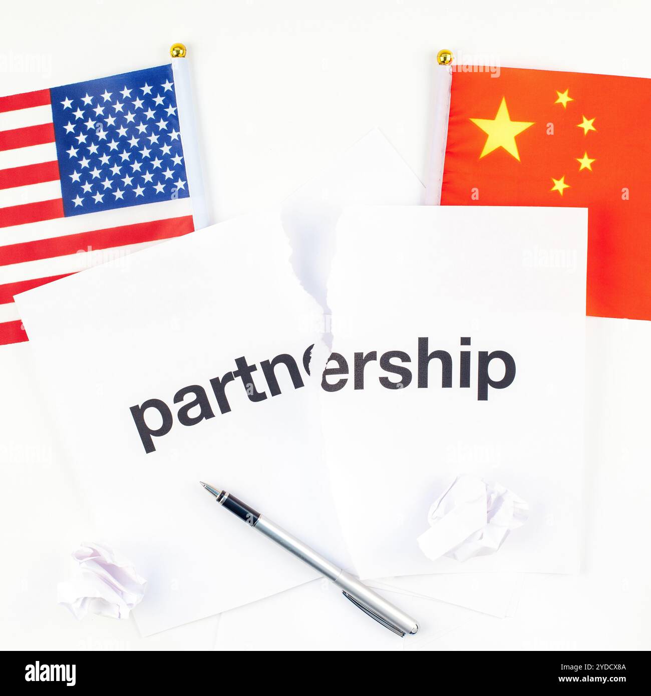 Creative top view flat lay of China and USA flag and broken partnership ...