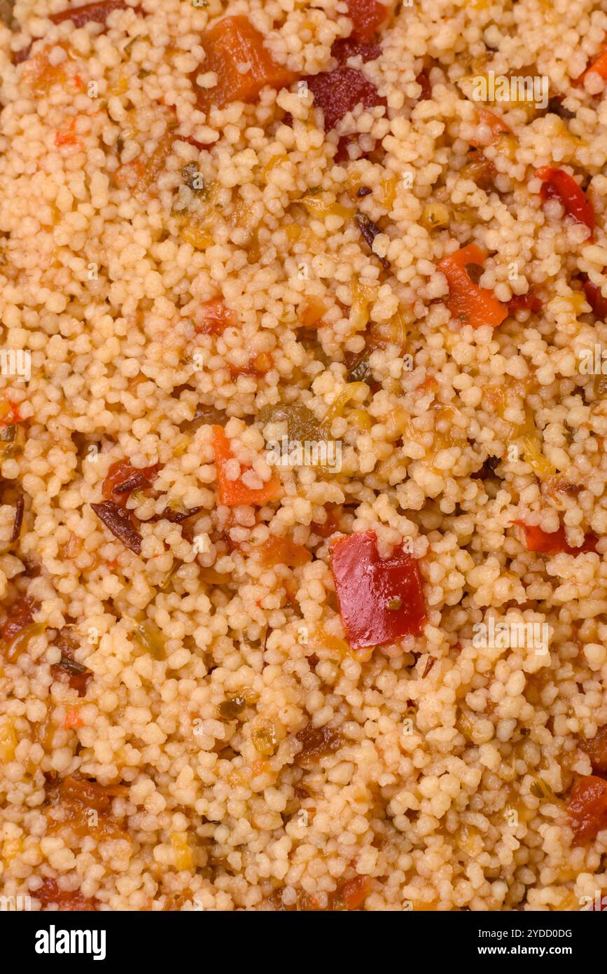 Delicious hot boiled wheat porridge couscous with vegetables Stock ...
