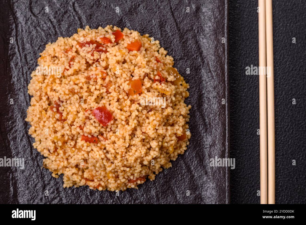 Delicious hot boiled wheat porridge couscous with vegetables Stock ...