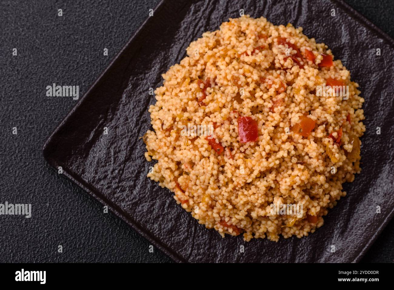 Delicious hot boiled wheat porridge couscous with vegetables Stock ...