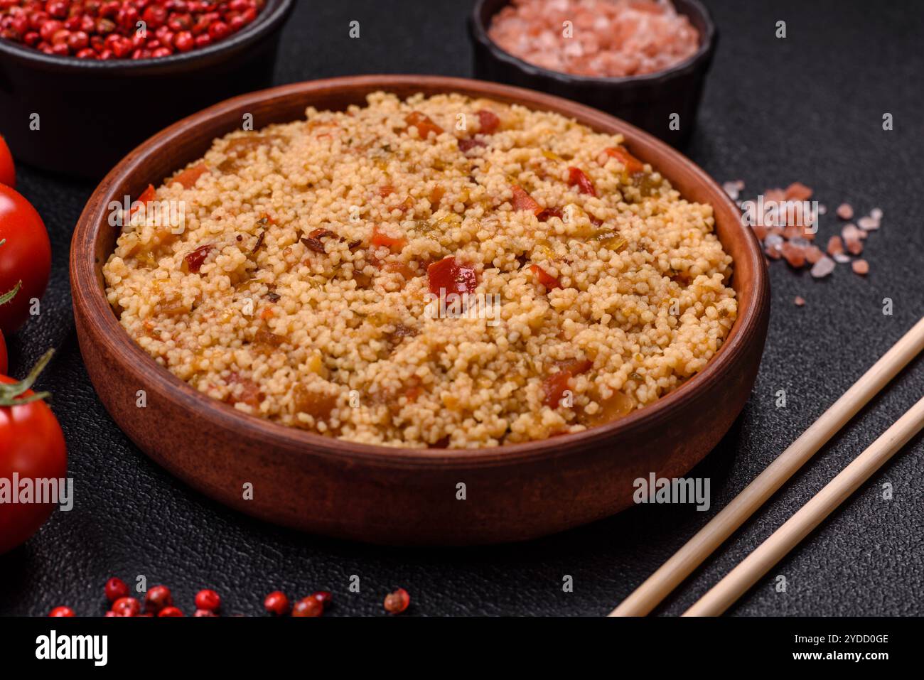 Delicious hot boiled wheat porridge couscous with vegetables, vegan ...