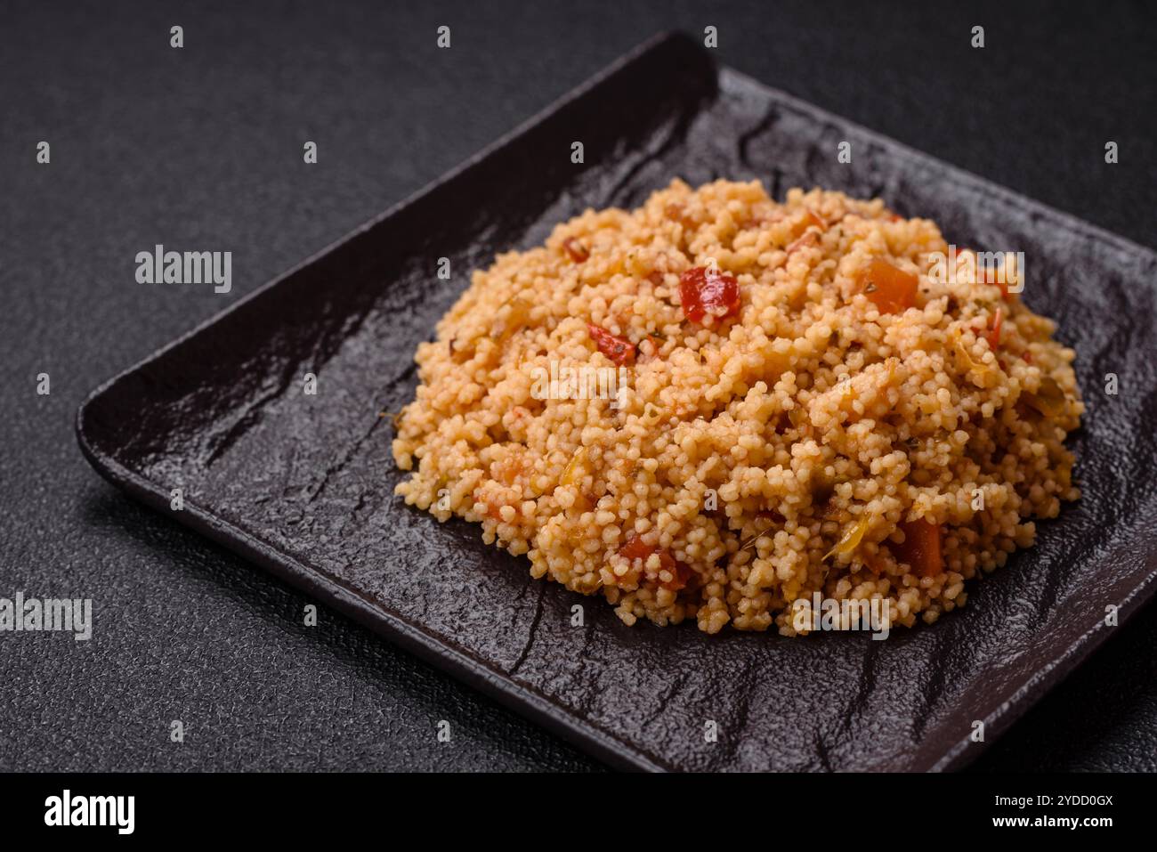 Delicious hot boiled wheat porridge couscous with vegetables Stock ...