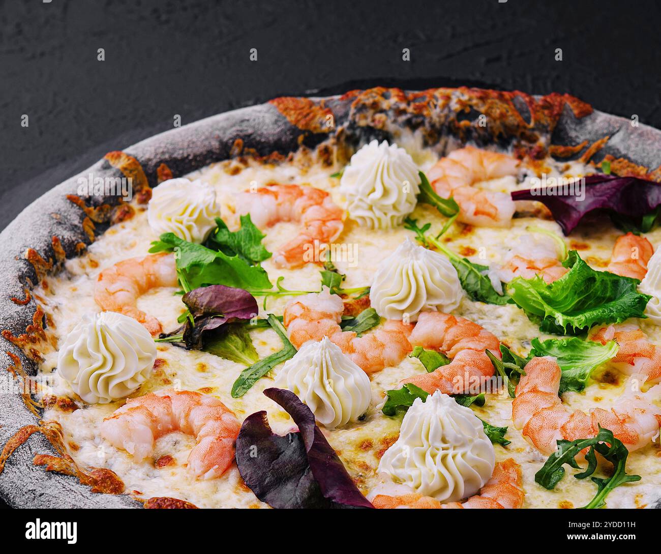 black pizza with shrimp and cream Stock Photo - Alamy