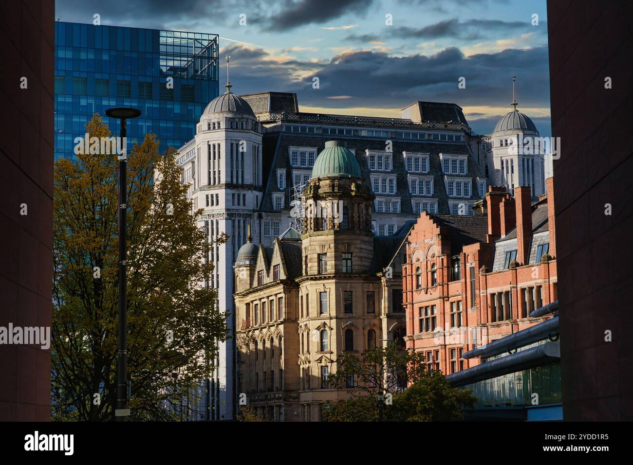 A view of a city skyline with multiple buildings, including a tall ...