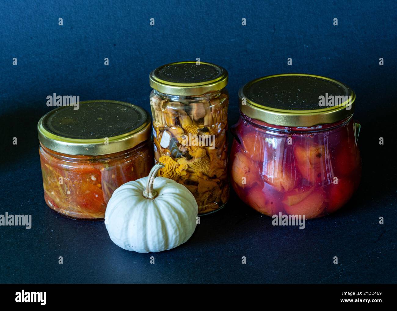 still life, autumn harvest in glass jars, autumn vegetables ...