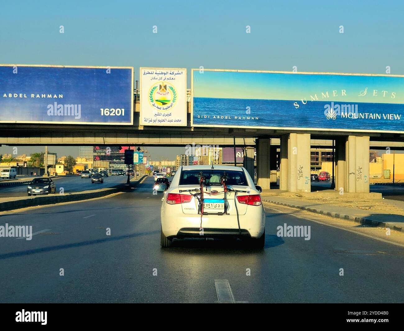 Cairo, Egypt, October 12 2024: A KIA Cerato car with a bicycle holder bike rack on its back, KIA ...