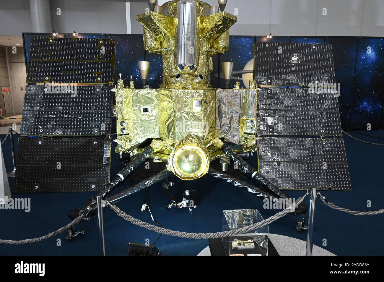 A model of Martian Moons eXploration(MMX) spacecraft is displayed ...