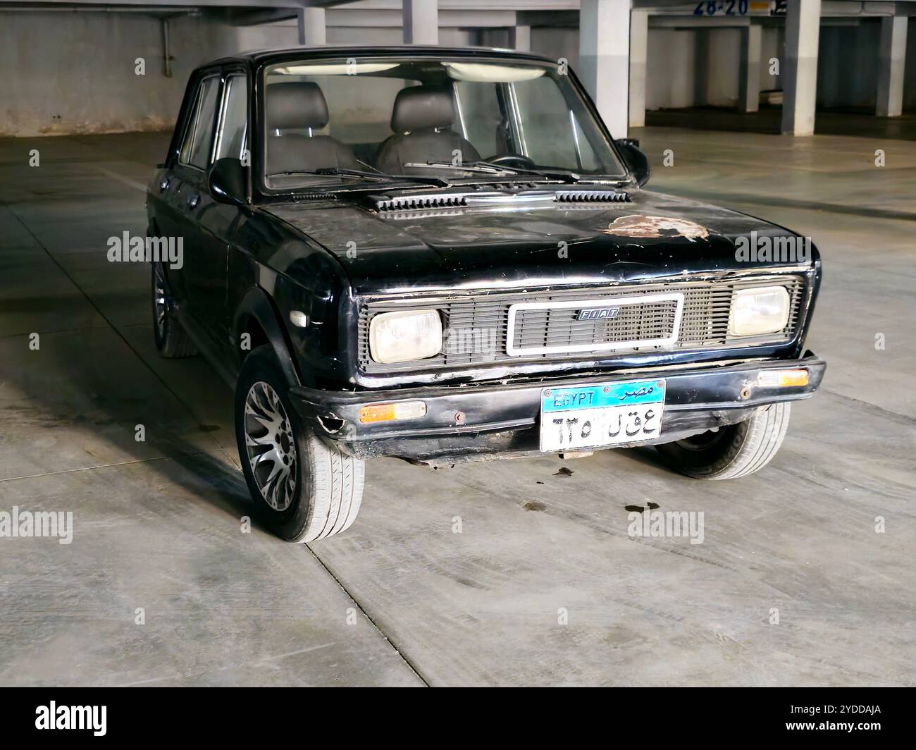 Cairo, Egypt, October 3 2024: vintage retro old Fiat 128, a transverse front-engine, front wheel ...