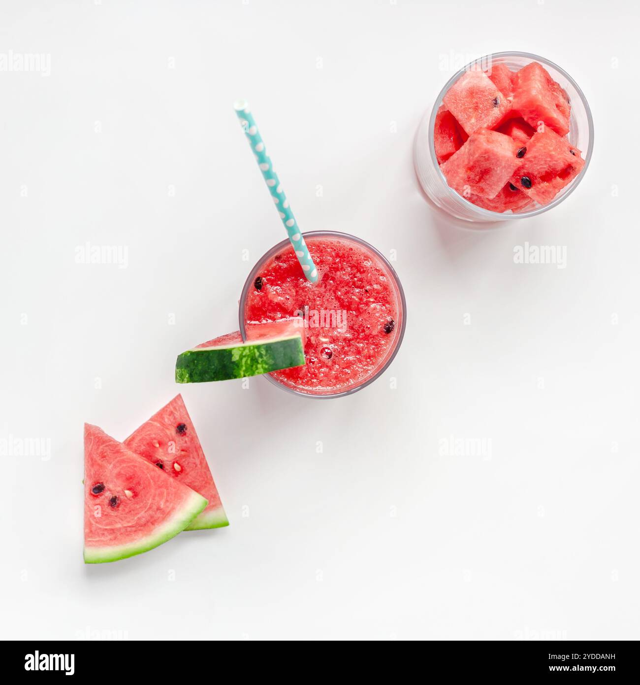 Watermelon smoothie with crushed fruits in glasses Stock Photo - Alamy