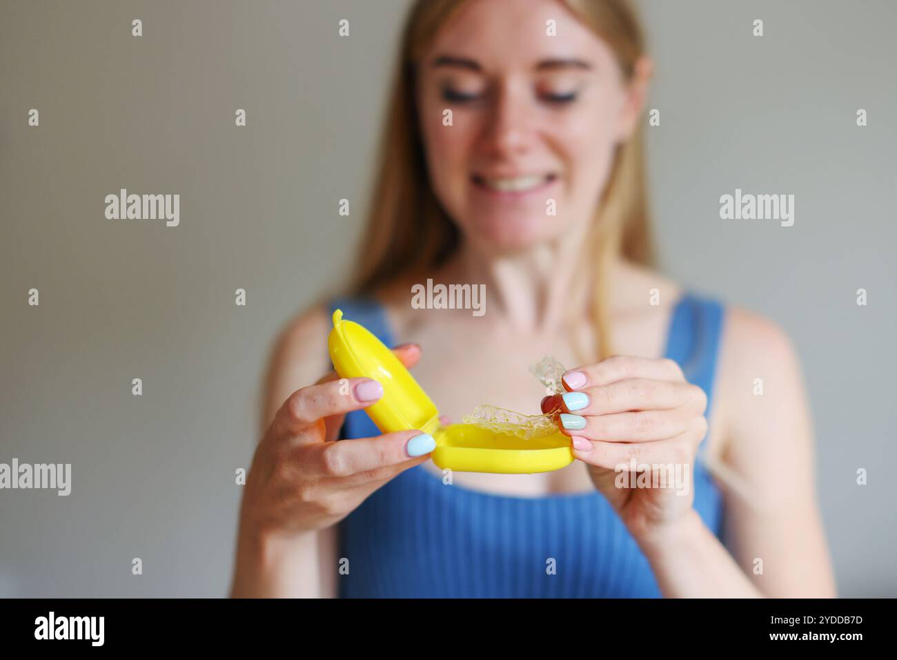 Transparent aligners in a box. Invisible braces. Clear teeth ...