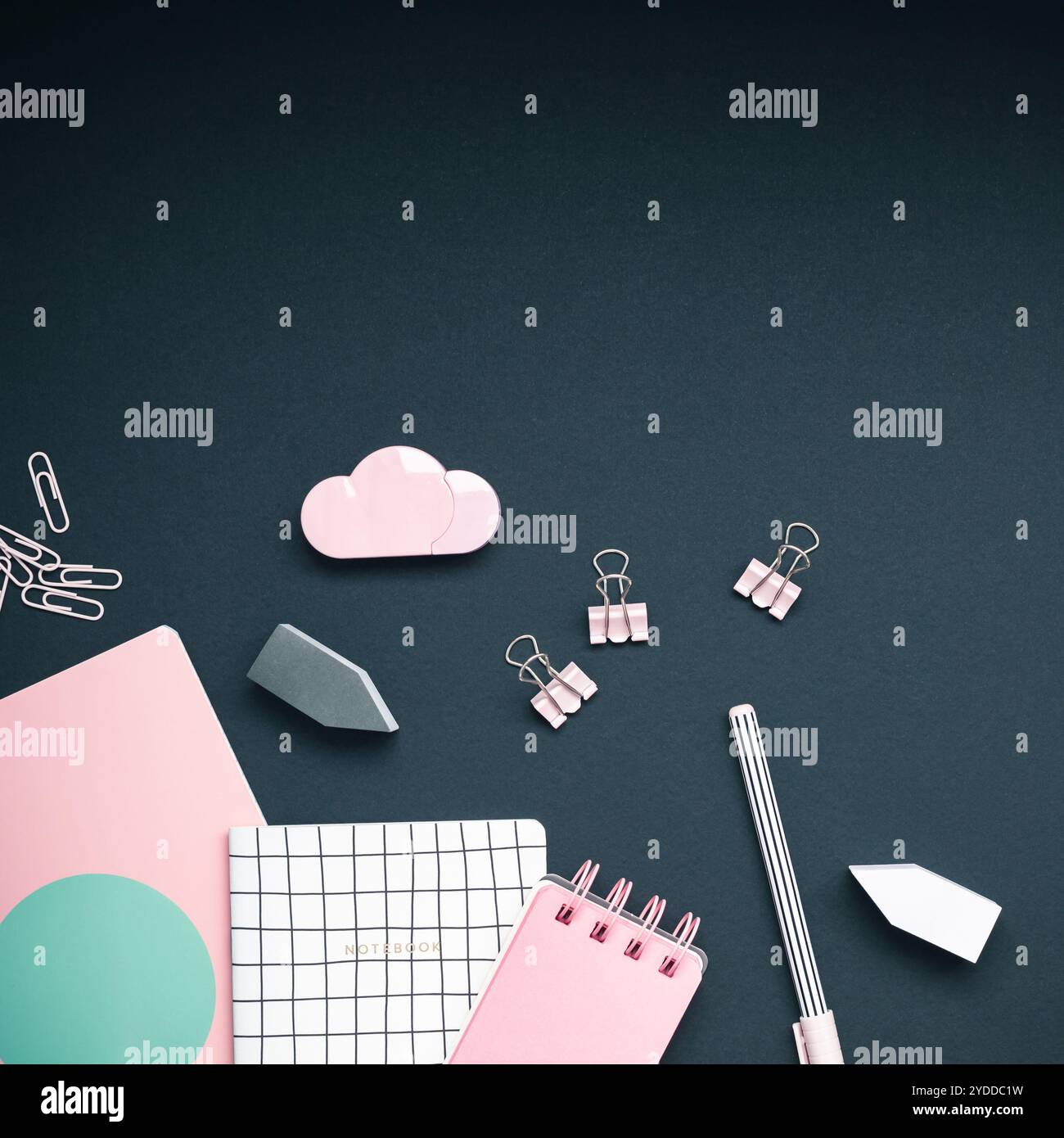 Pink colored objects on black background, top view Stock Photo - Alamy