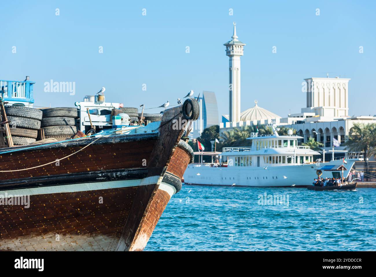 Traditional arabic cargo boats at Dubai creek, UAE Stock Photo - Alamy