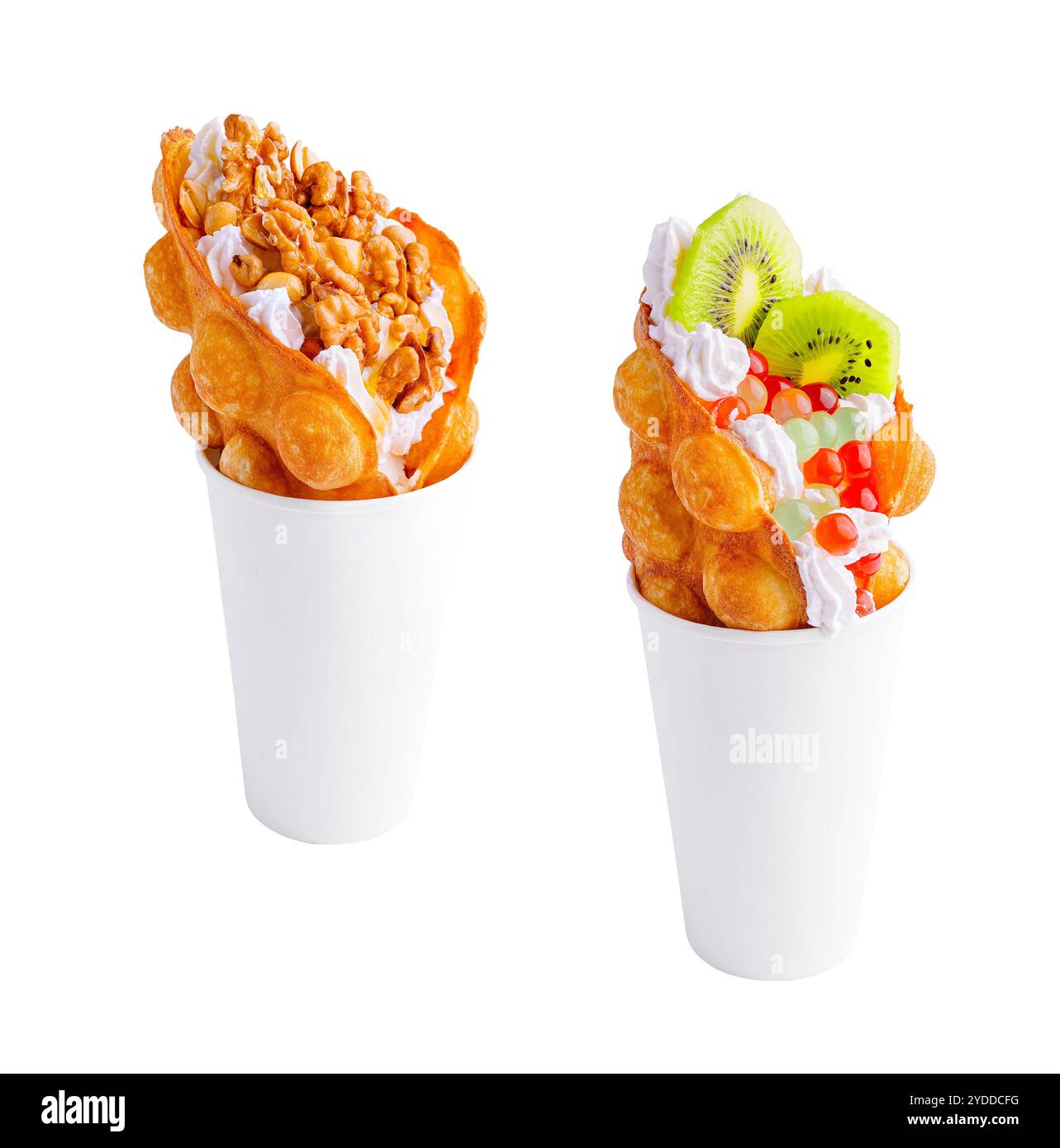 Bubble Waffle with kiwi, bubble tea, nuts and whipped cream Stock Photo ...