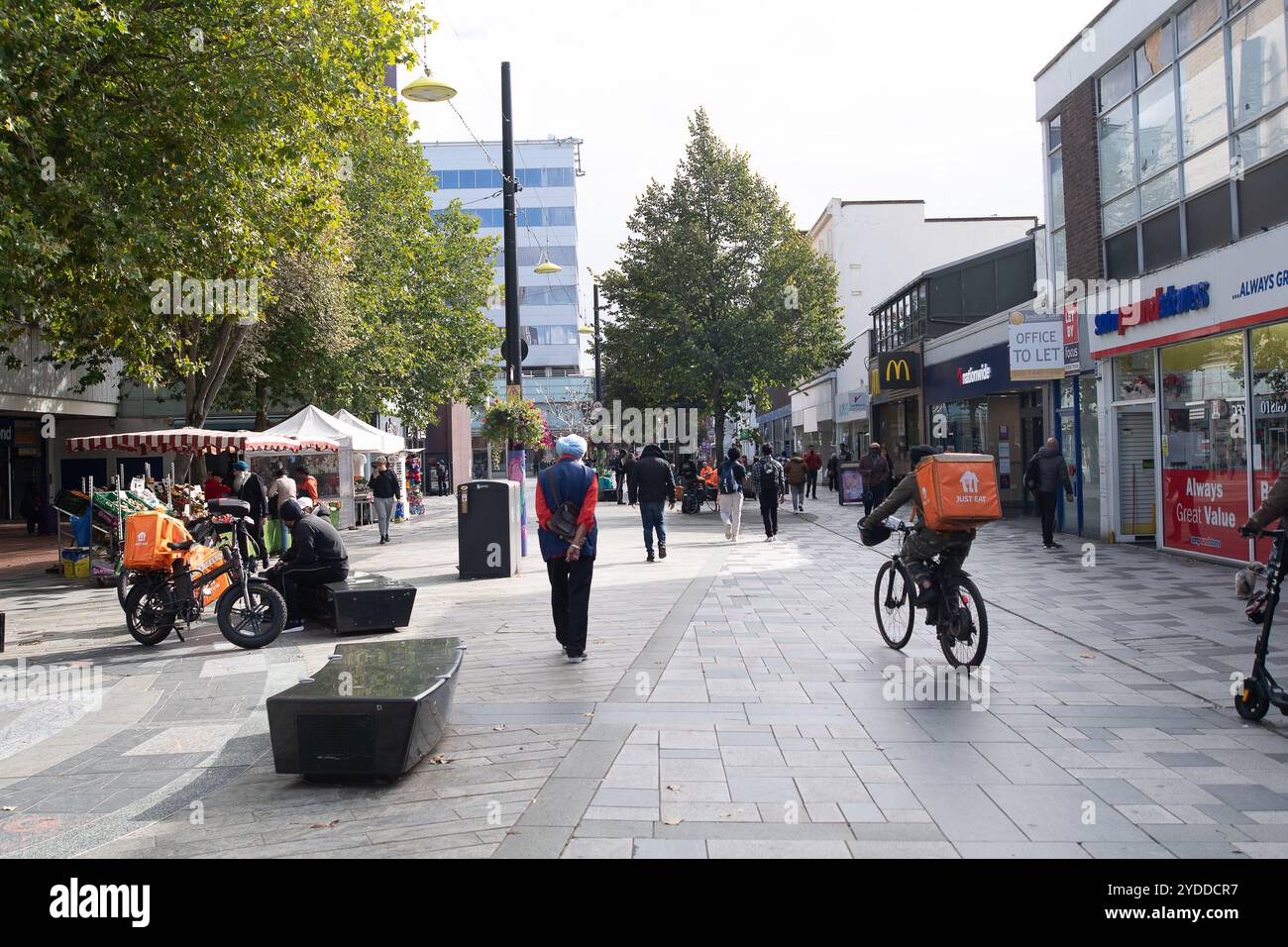 Slough, UK. 3rd October, 2024. Shoppers out in Slough High Street in ...