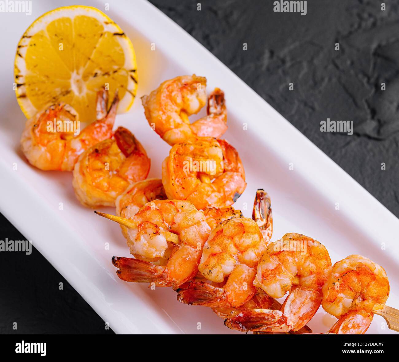 Grilled Shrimp Scampi Skewers with lemon Stock Photo - Alamy